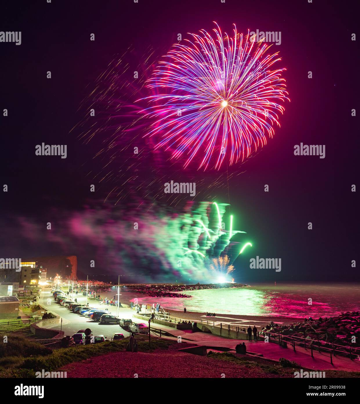 West Bay, Dorset, UK. 7th May 2023. A spectacular fireworks display at West Bay in Dorset during ...