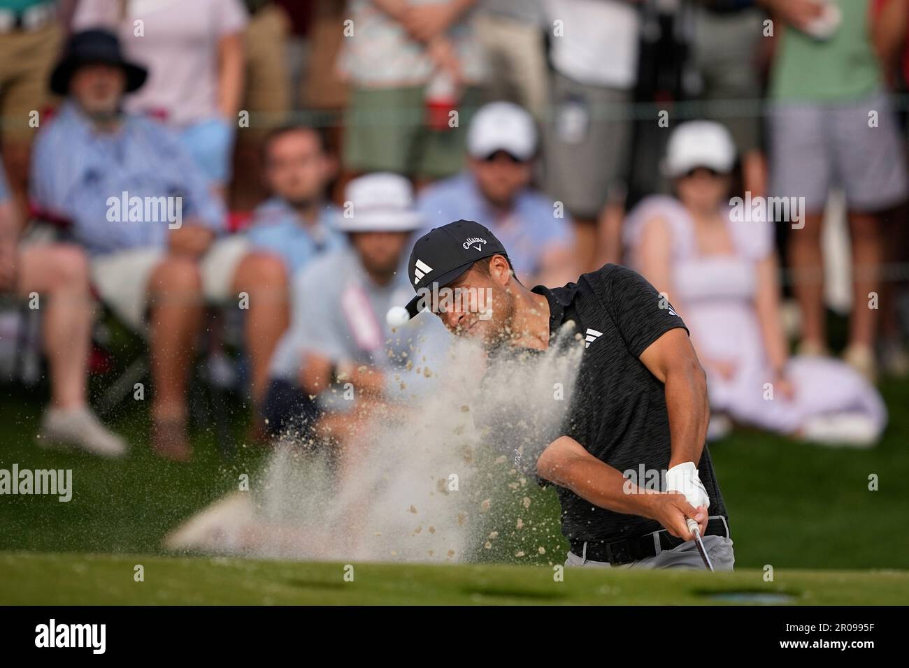 Xander Schauffele hits from a bunker on the 18th hole during final ...