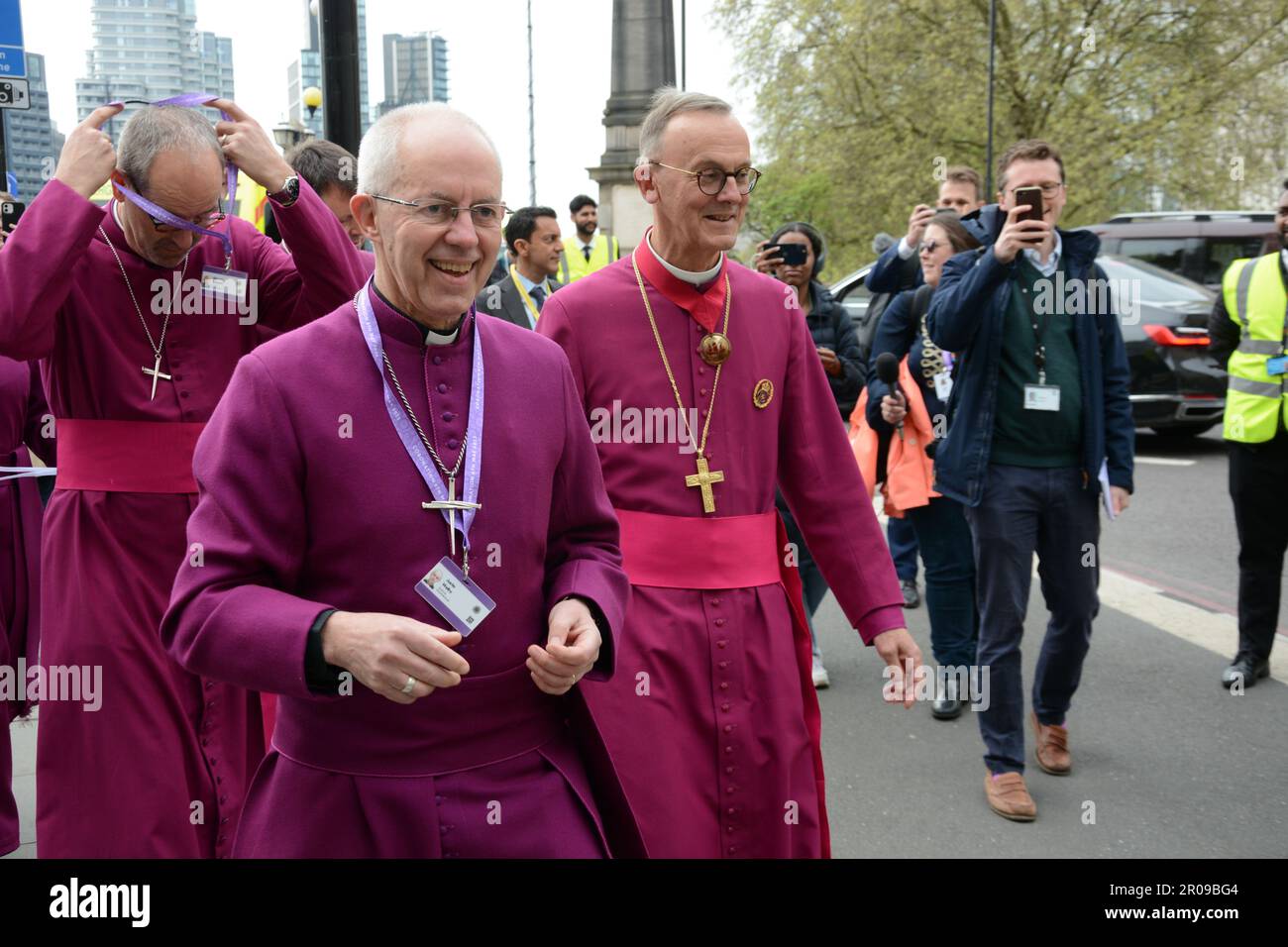 A relaxed Justin Welby casually saunters by Lambeth Bridge on his way ...