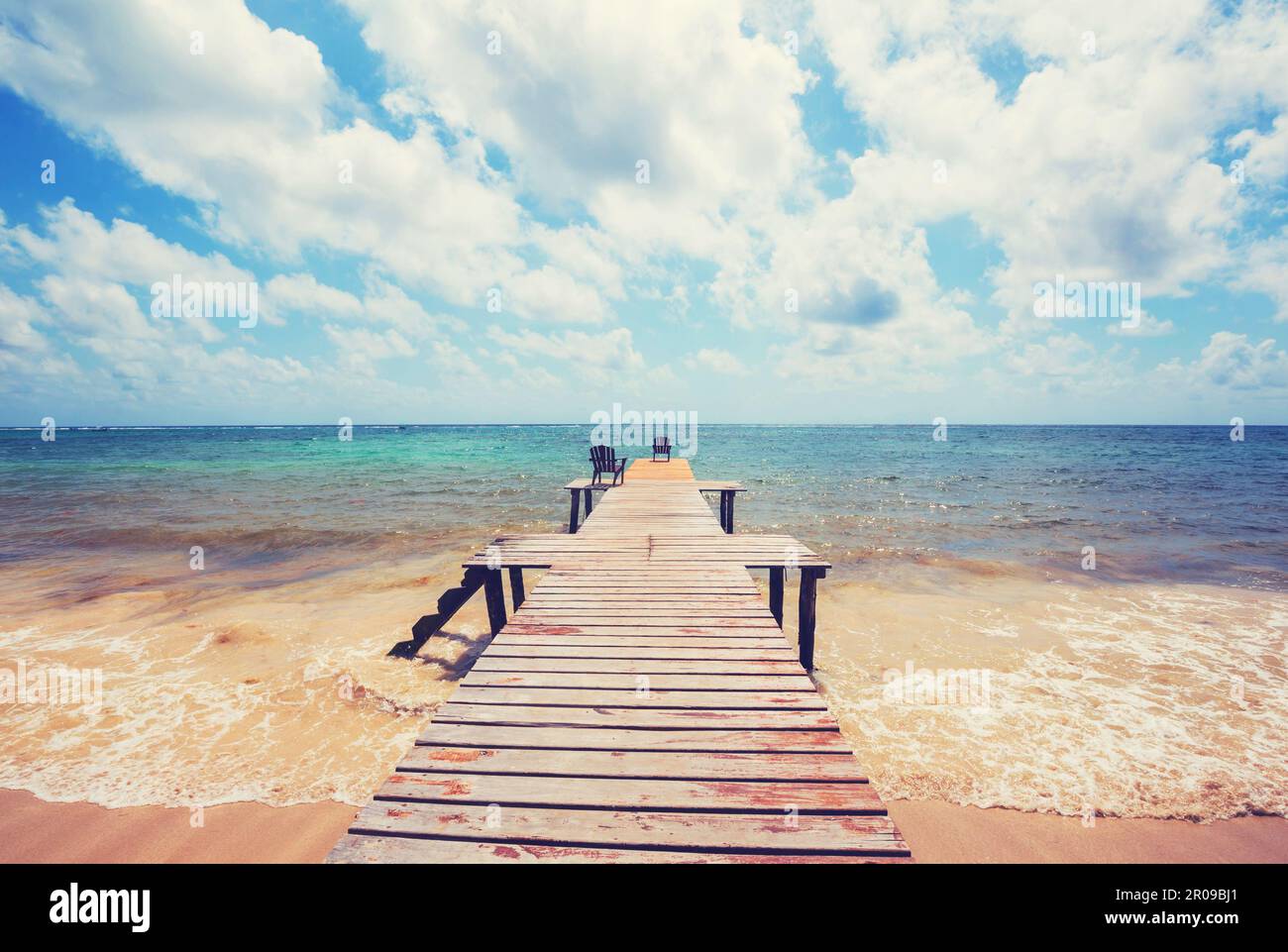 boardwalk on the tropical beach Stock Photo - Alamy