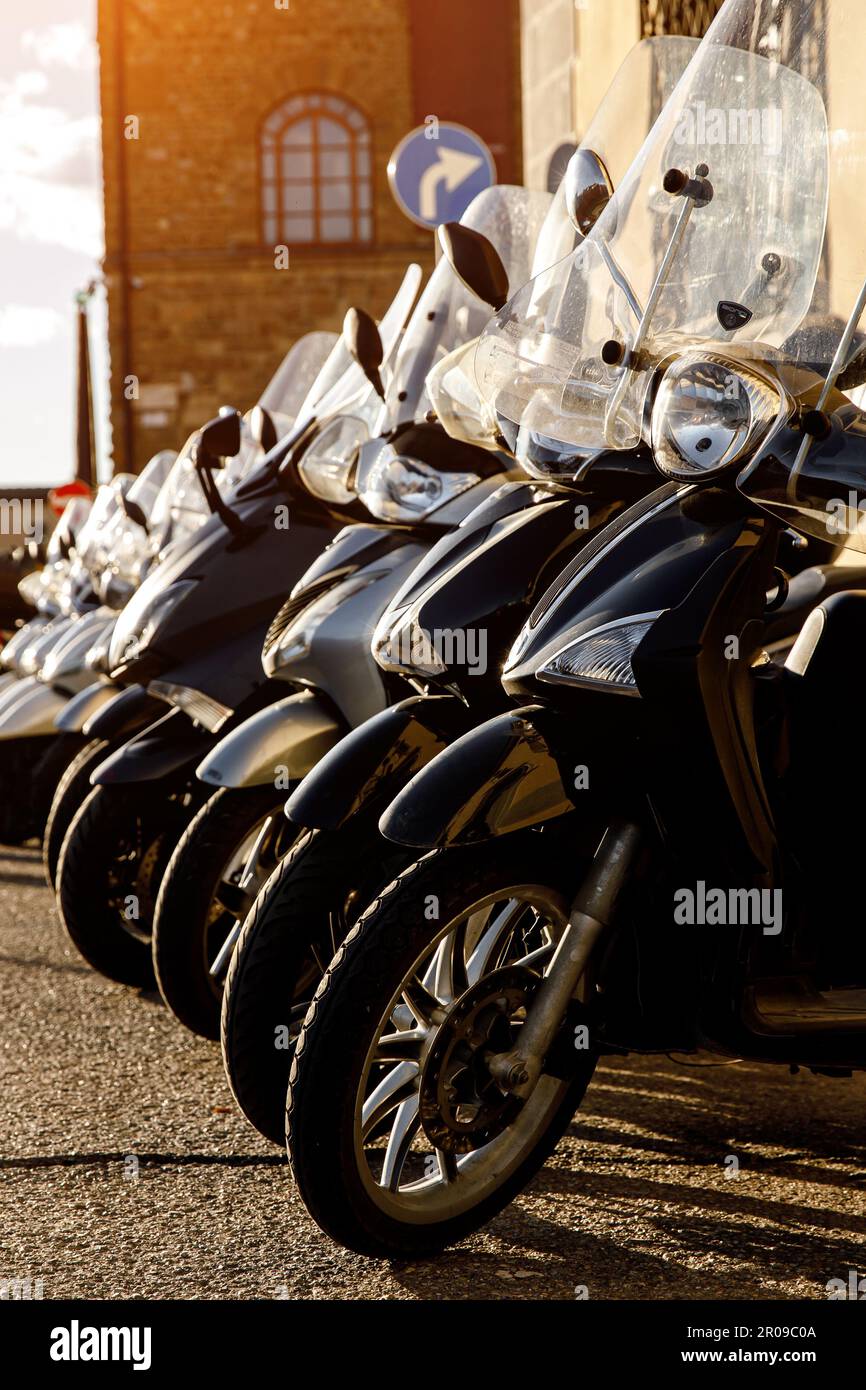 Classic scooters on the narrow streets of Italian city Stock Photo - Alamy