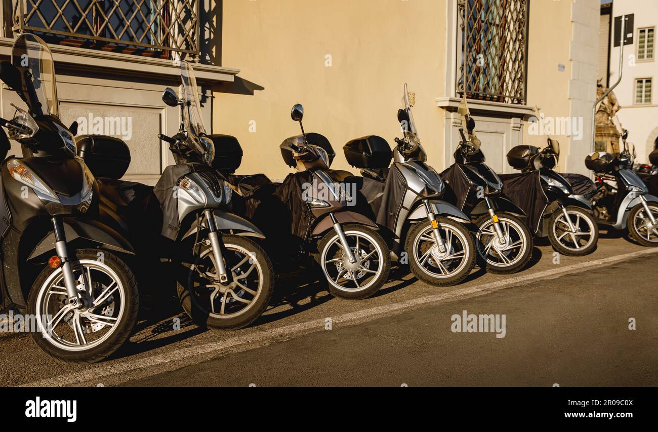Narrow village street scooters hi-res stock photography and images - Alamy