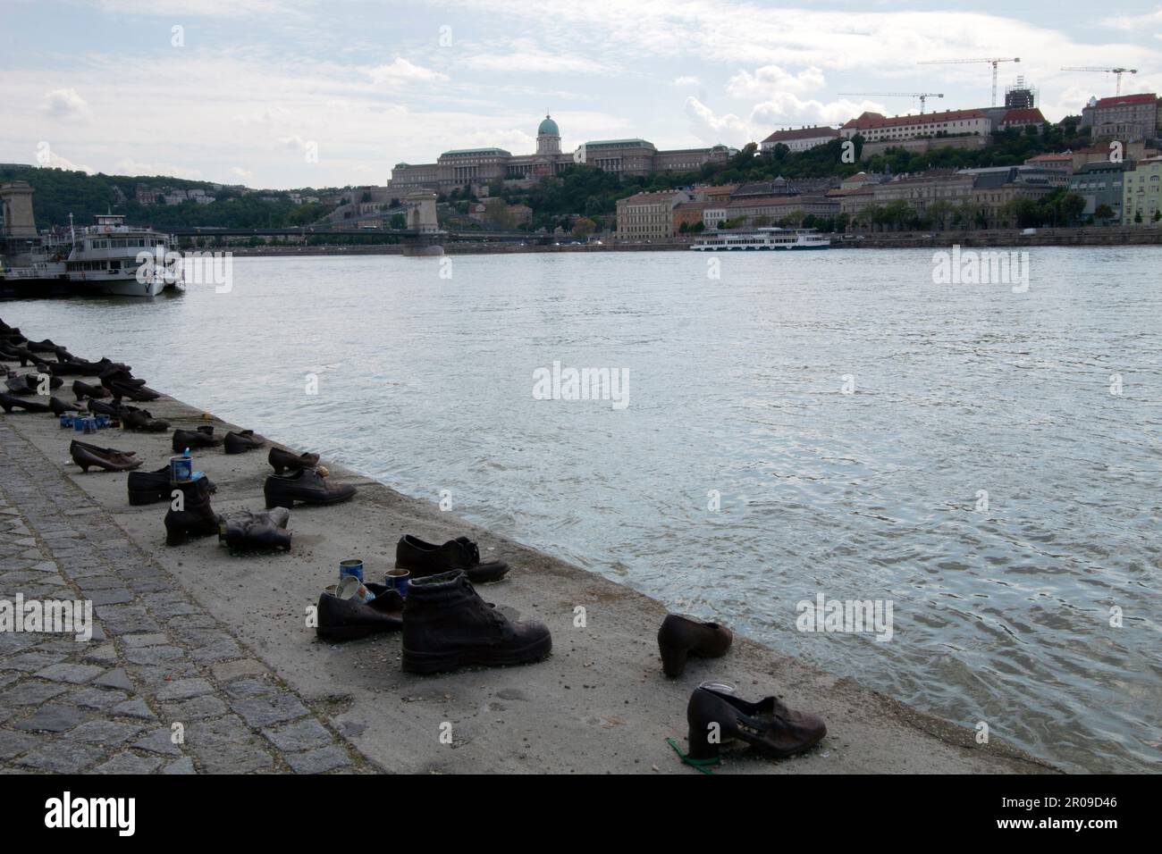 Sculpture of shoes along the Danube by artist Gyula Pauer memorialized ...