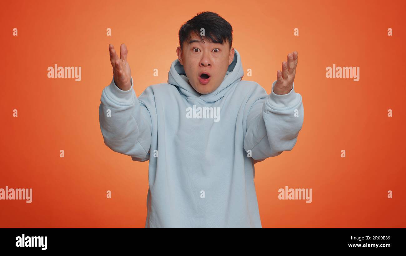 Oh my God, Wow. Excited amazed winner man raising hands in surprise ...