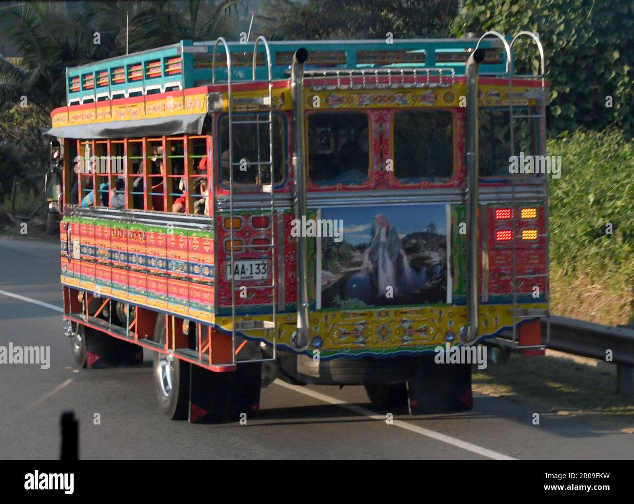 Usa. 24th Feb, 2023. A brightly colored open air "Chiva"" bus is seen ...