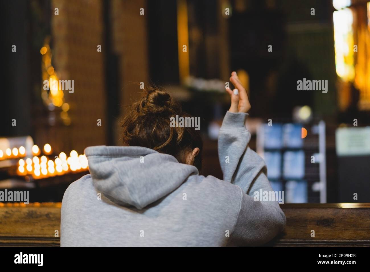 Woman praying on knees catholic hi-res stock photography and images - Alamy