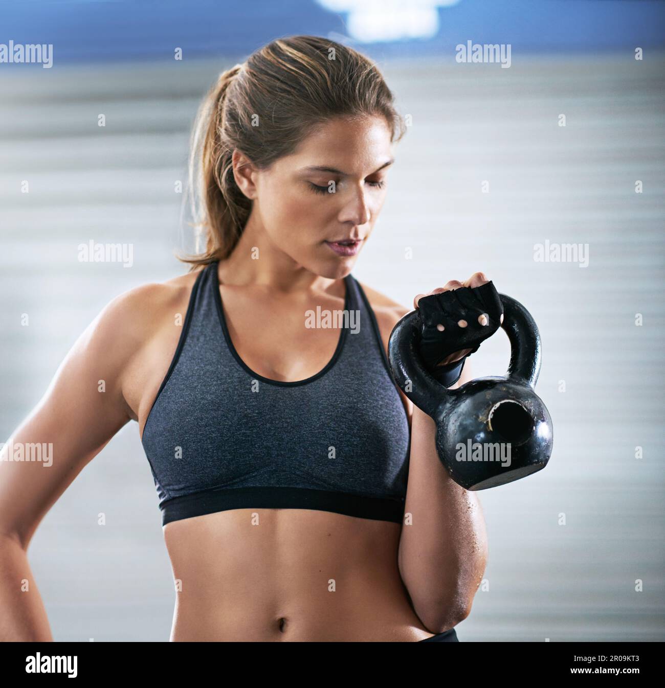 Woman gym kettle bell workout hi-res stock photography and images - Alamy