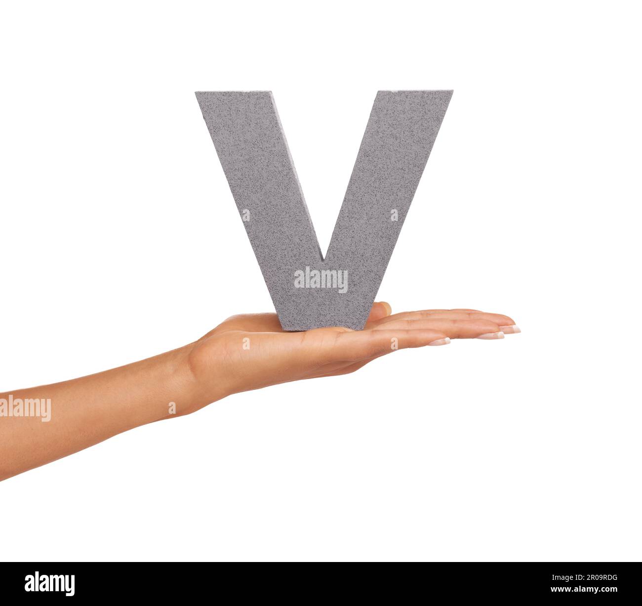 Heres a V for you. A young woman holding a capital letter V isolated on ...