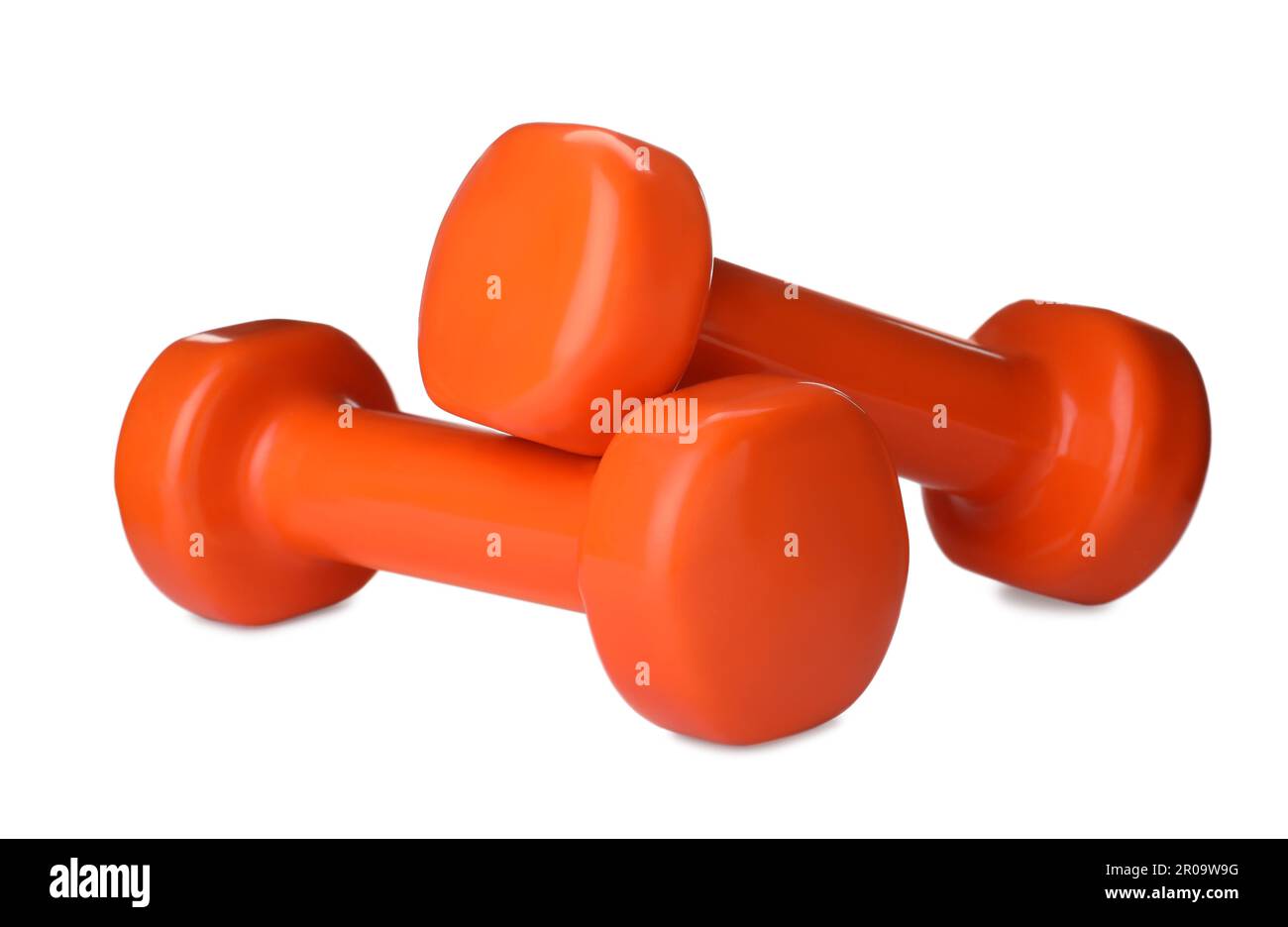 Orange dumbbells on white background. Weight training equipment Stock ...