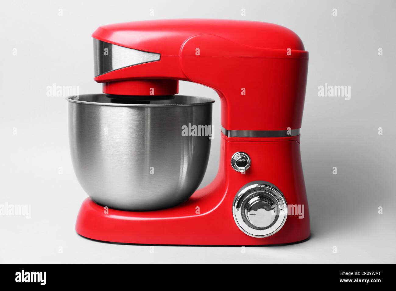 Modern red stand mixer on light grey background Stock Photo - Alamy