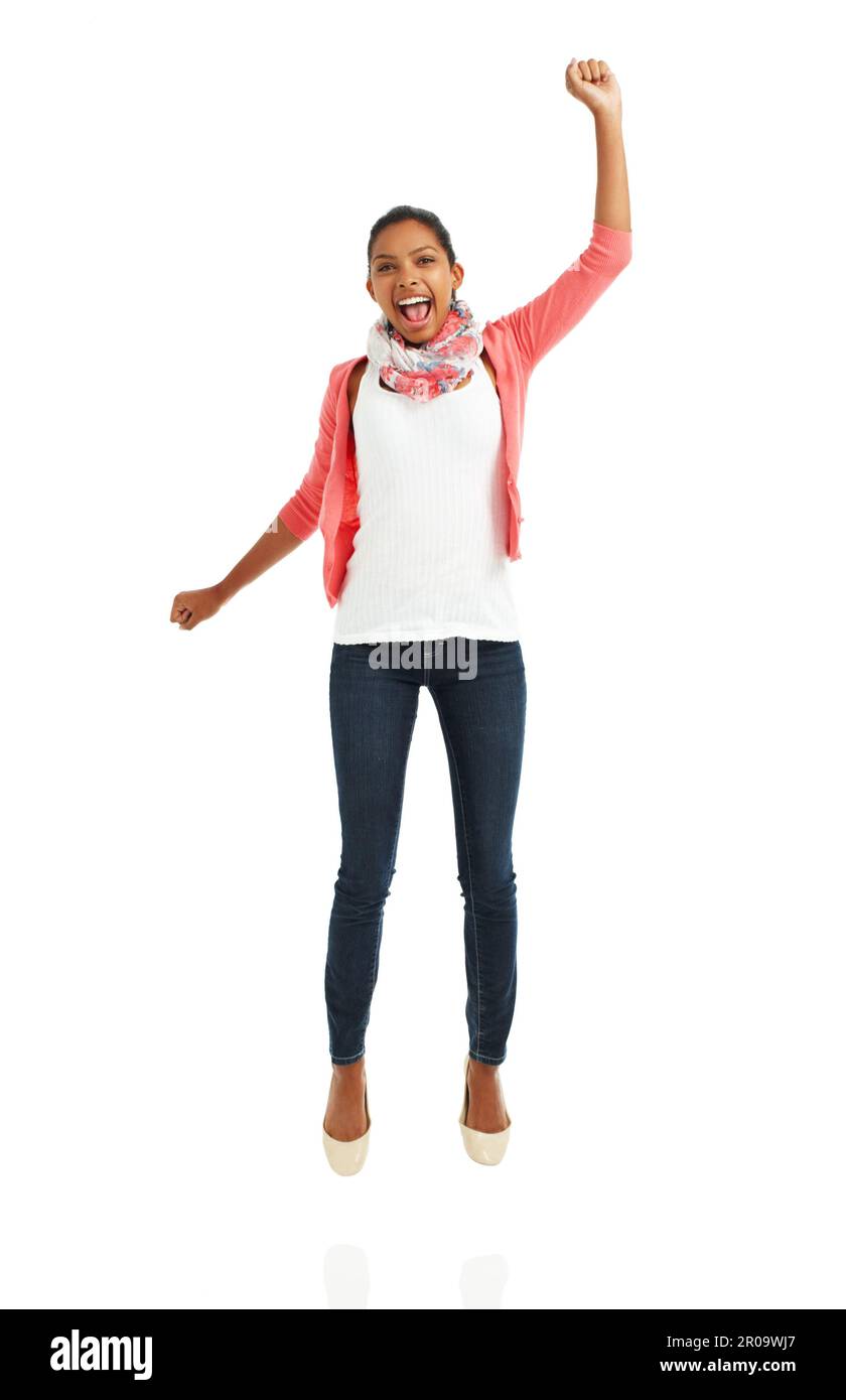 She has a spring in her step. A full body portrait of a pretty young ...