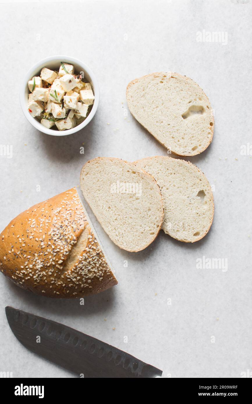 slices of artisan bread, top view of sesame coated bread slices on a ...