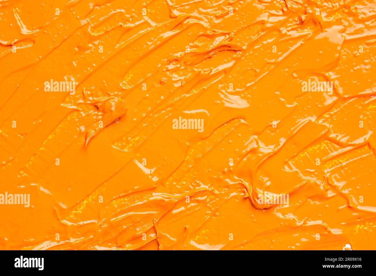 Beautiful strokes of orange oil paint as background, closeup Stock ...