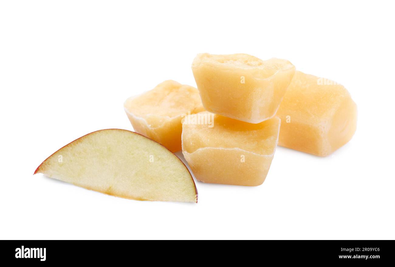 Frozen apple puree cubes and fruit on white background Stock Photo - Alamy