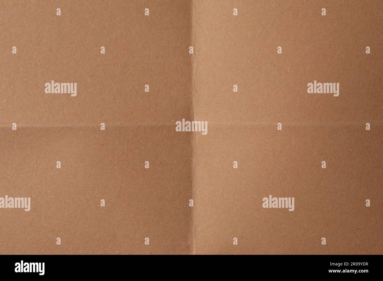 Folded kraft paper sheet as background, top view Stock Photo - Alamy