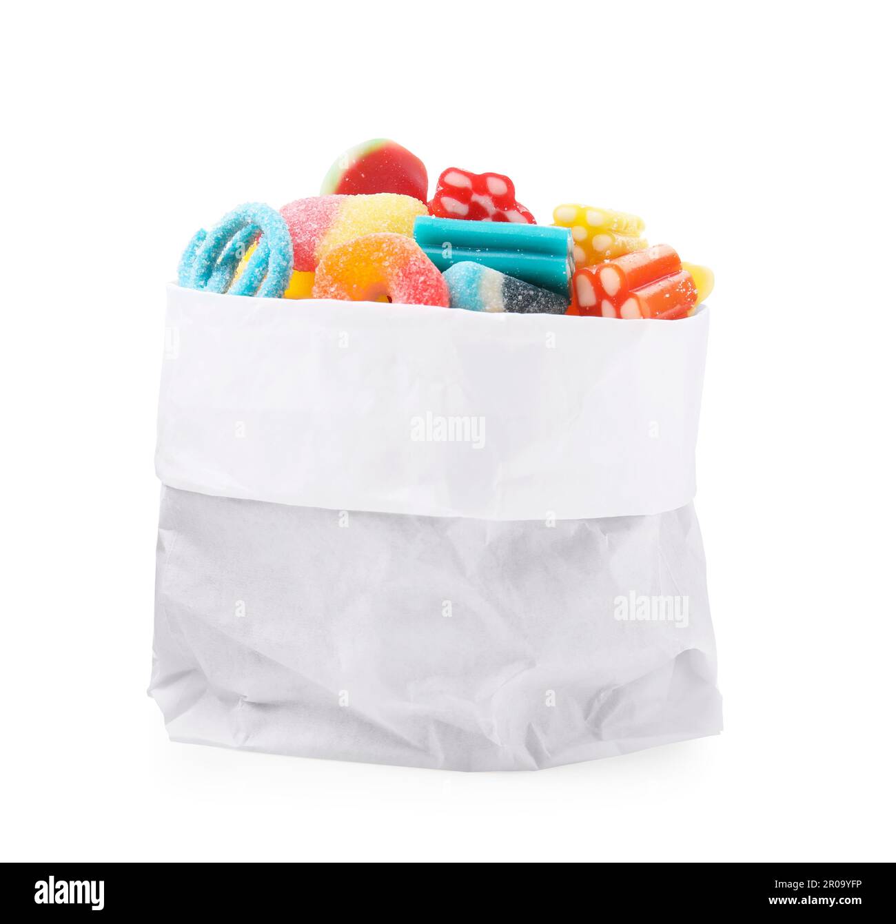Paper bag of tasty colorful jelly candies on white background Stock ...