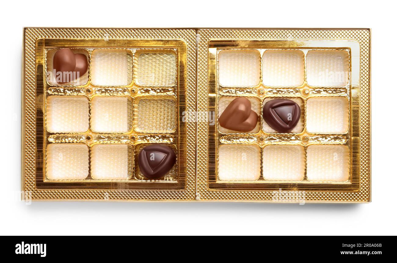 Partially empty box of chocolate candies isolated on white, top view ...
