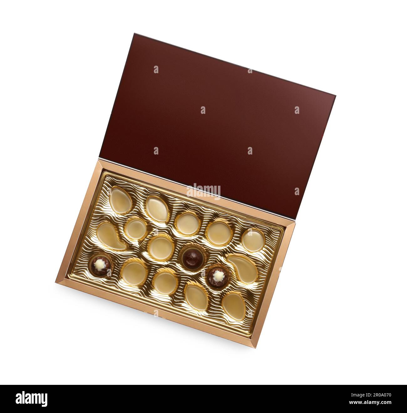 Partially empty box of chocolate candies isolated on white, top view ...