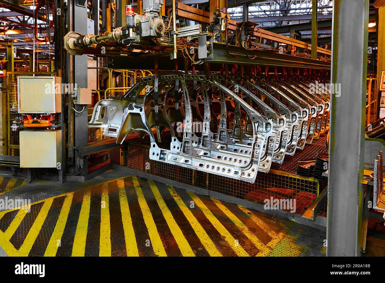 Details of car carcass hang on assembling conveyor Stock Photo - Alamy