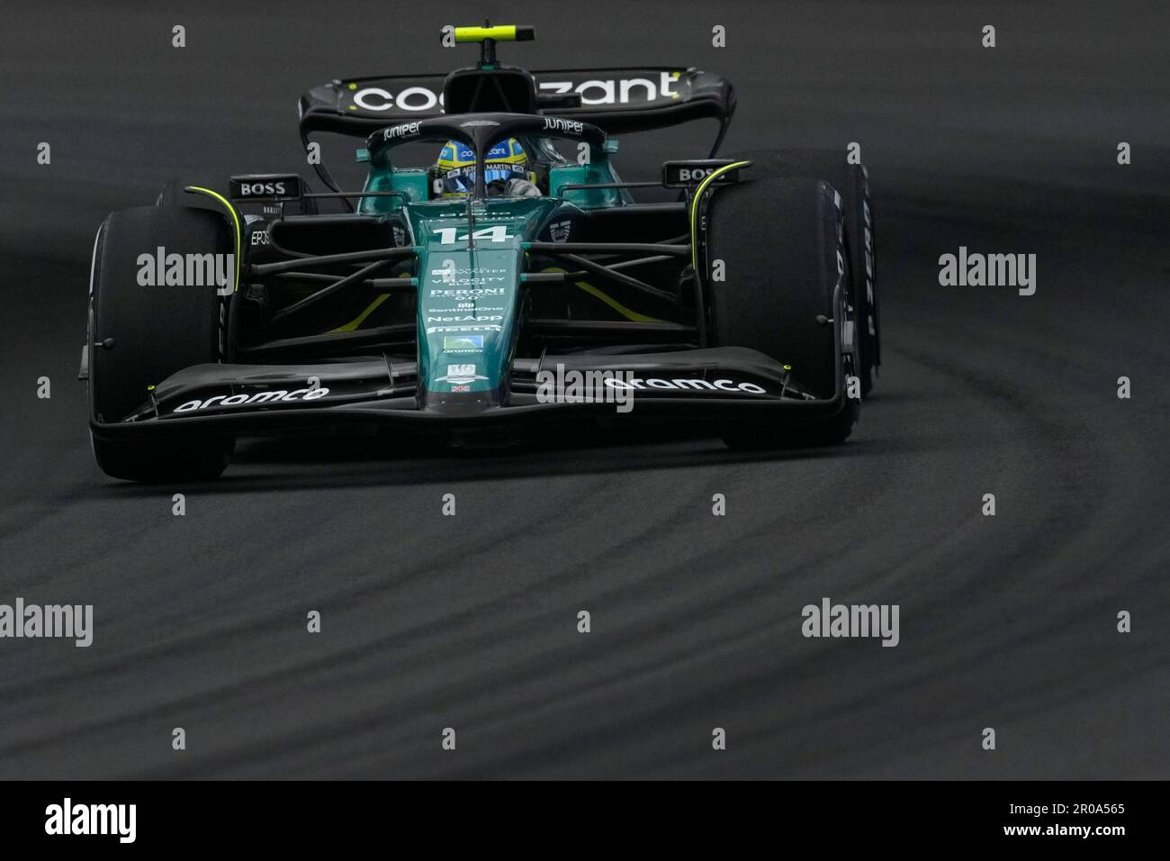 Aston Martin driver Fernando Alonso of Spain steers his car during the ...