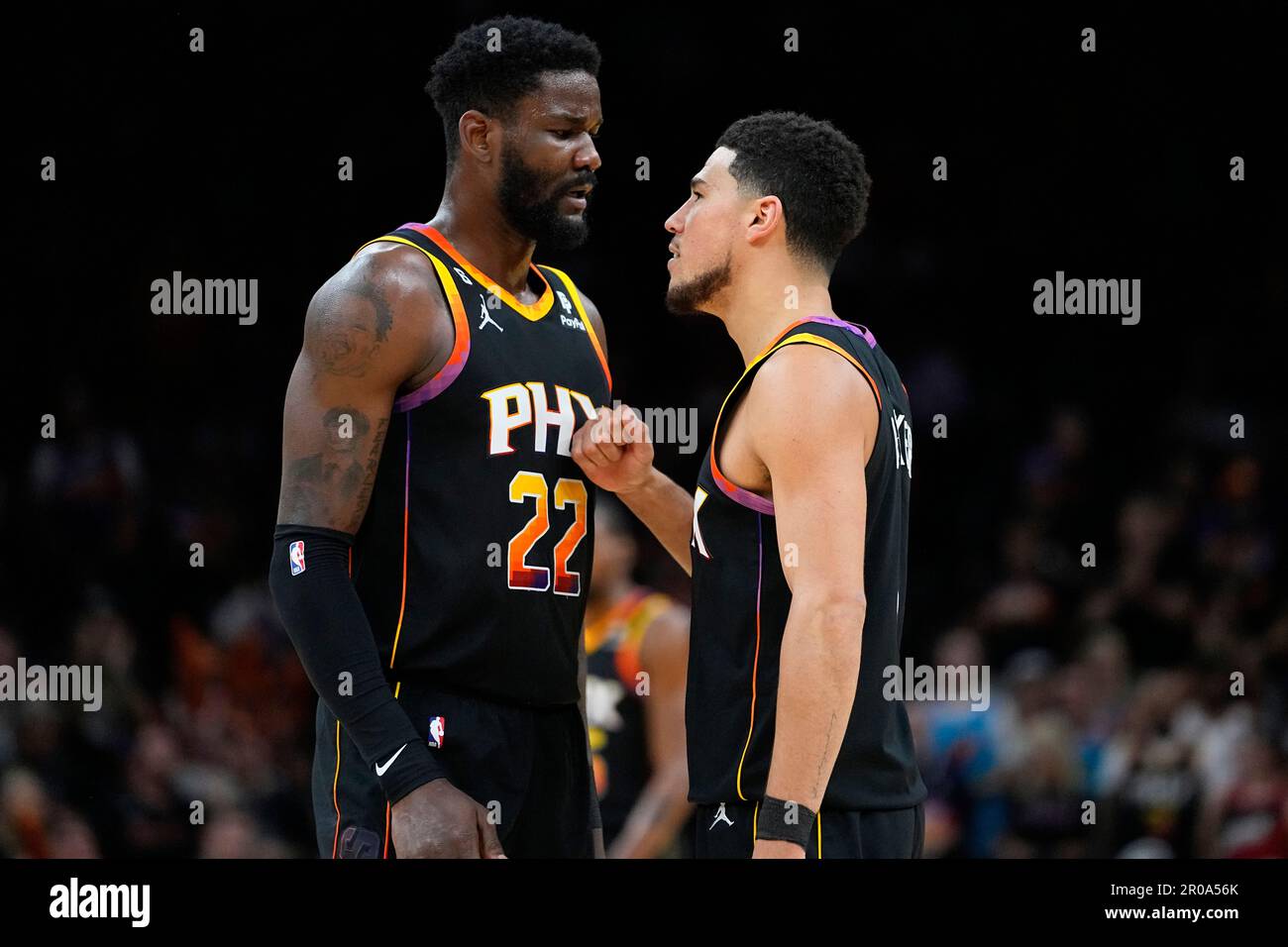 Phoenix Suns guard Devin Booker talks with Phoenix Suns center Deandre ...