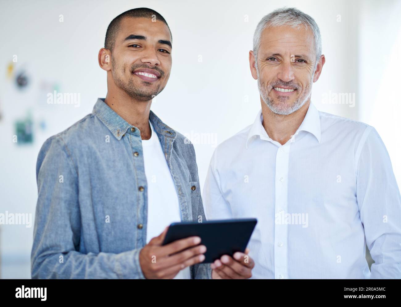 Hes a prodigy. Portrait of two business colleagues standing in an ...