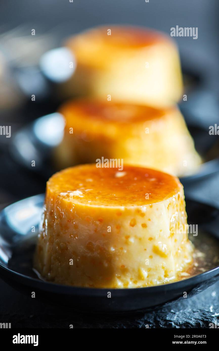 Creme caramel, flan, or caramel pudding is a custard dessert with a ...