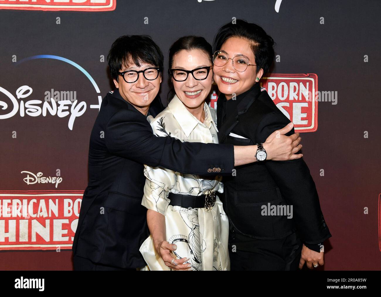 Ke Huy Quan, left, Michelle Yeoh and Echo Quan attend the premiere of the Disney+ original ...