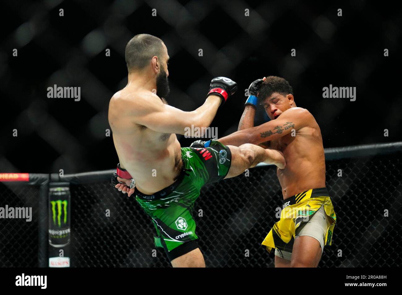 NEWARK, NJ - MAY 06: (L-R) Belal Muhammed kicks Gilbert Burns in a ...