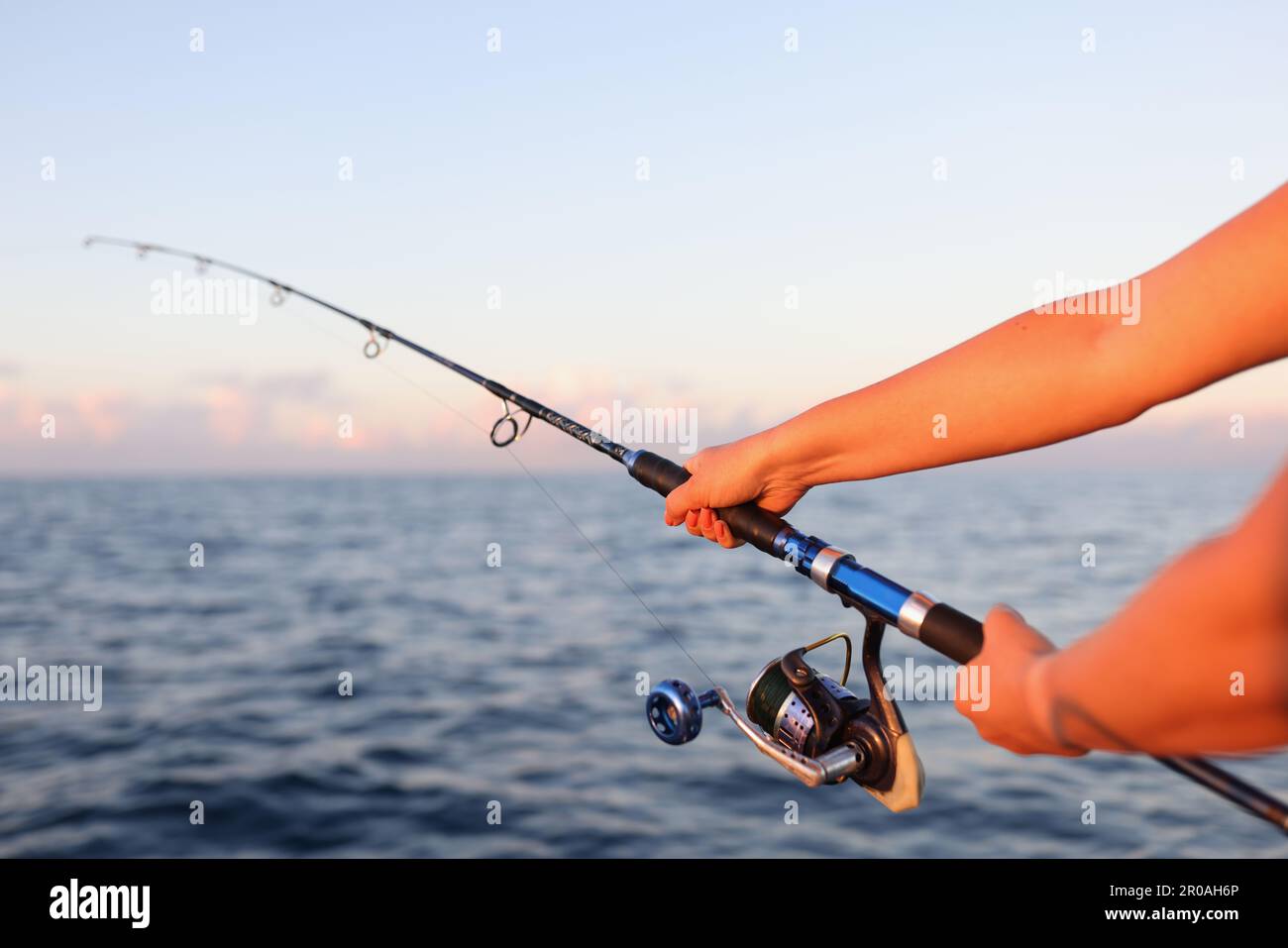 Hand holding cable reel hi-res stock photography and images - Alamy