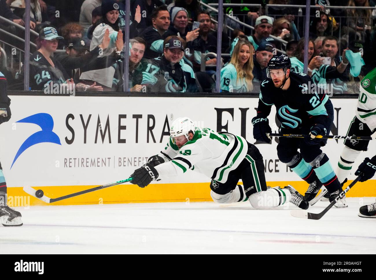 Dallas Stars center Radek Faksa (12) falls while trying to keep control ...