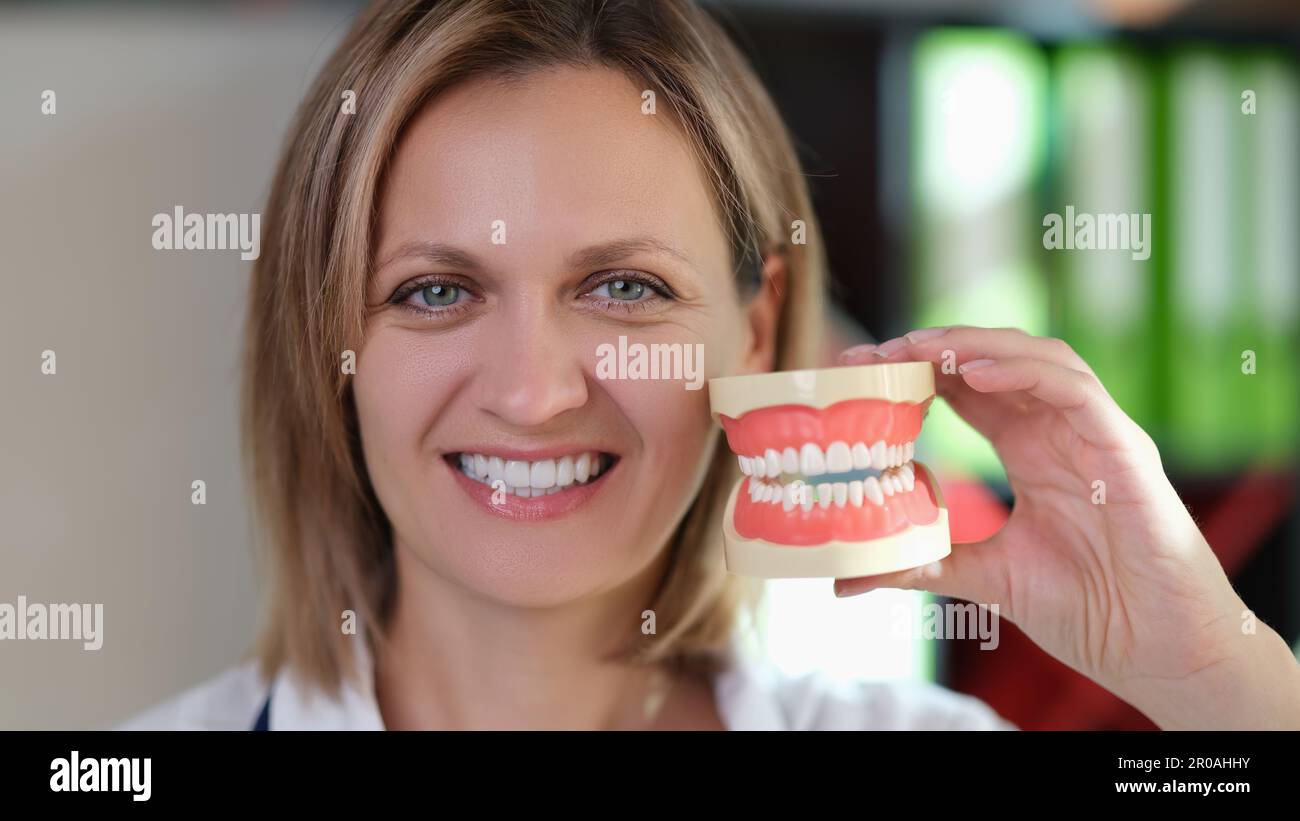 Woman showing no teeth hi-res stock photography and images - Alamy