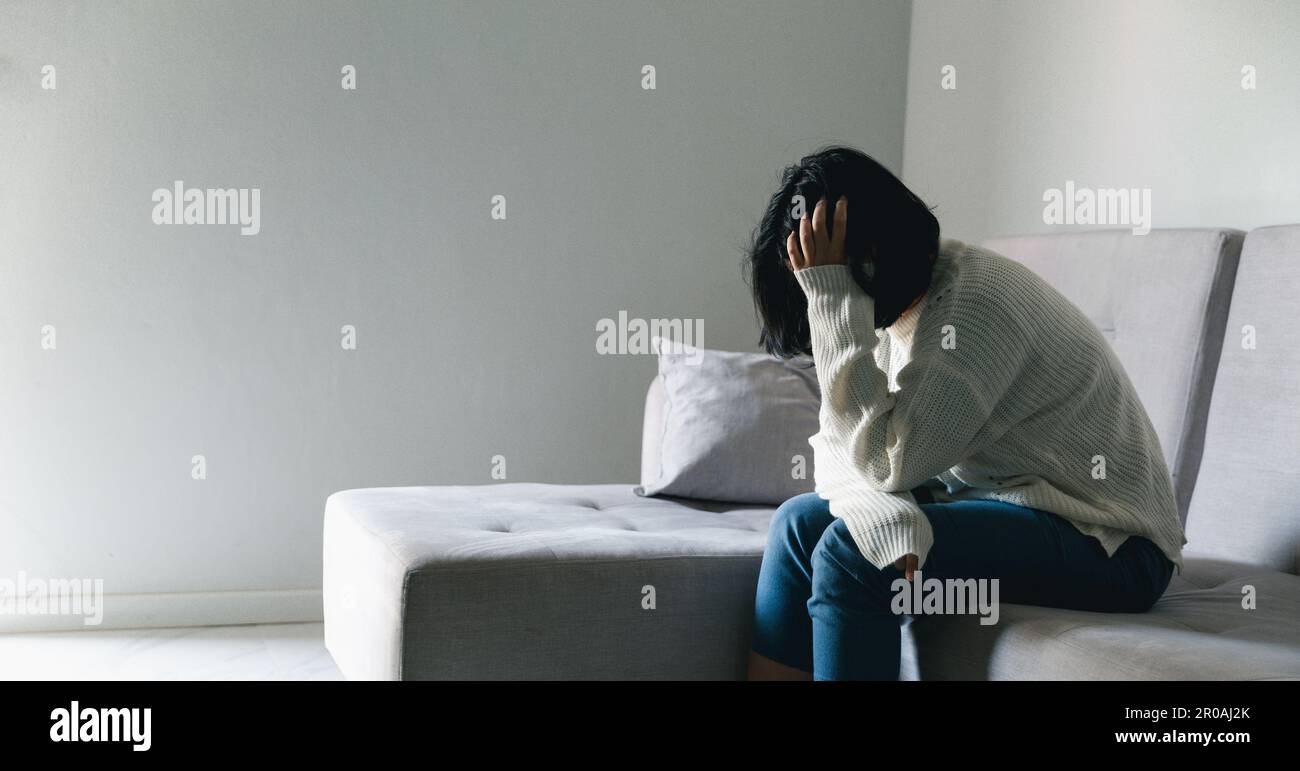 Concept of sad teenage girl depression. Upset teenage girl sitting at ...