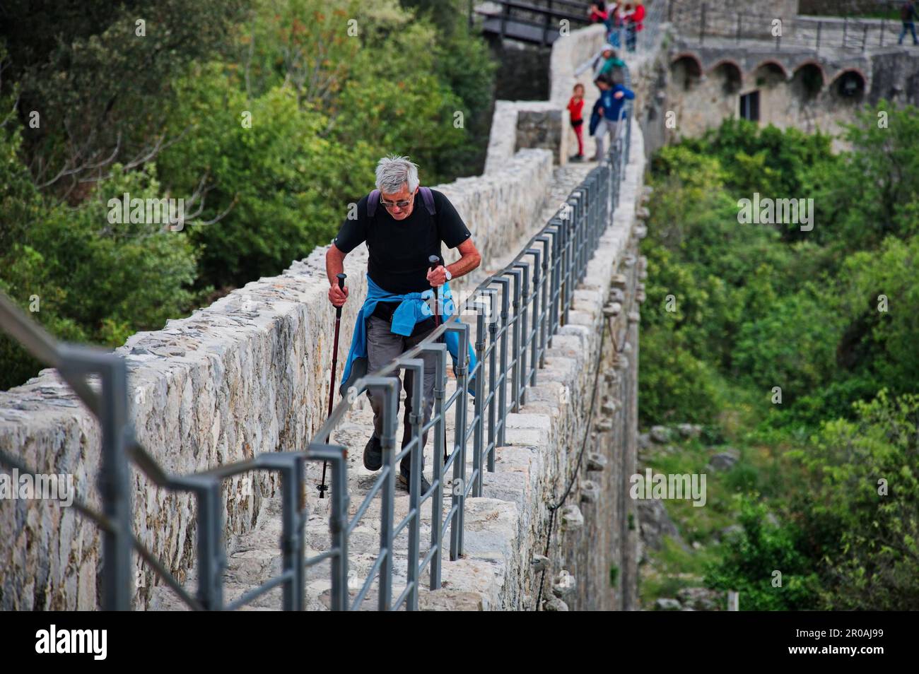 Man climbing stairs hi-res stock photography and images - Alamy