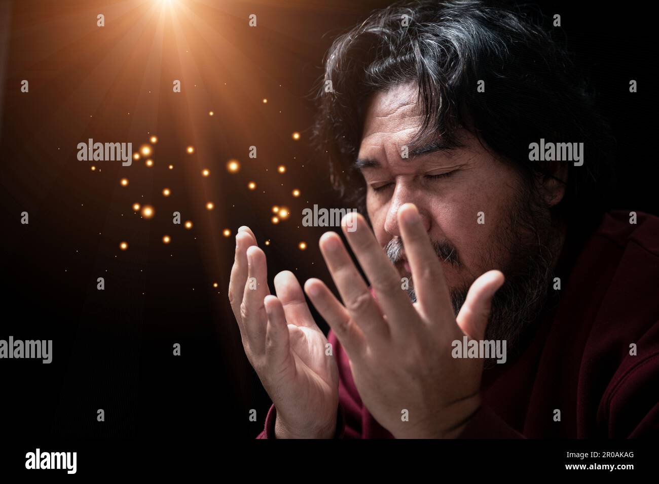 Hands folded in prayer on in church concept for faith, spirituality and ...