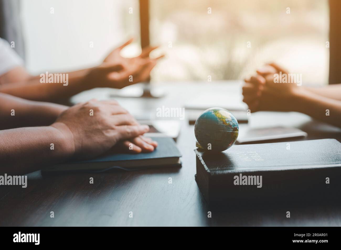 Concept of Christian ministry. Small groups pray together for Christian ...