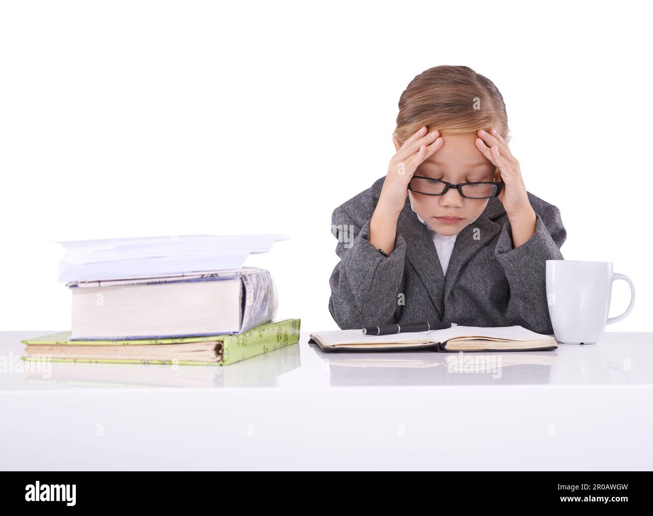 Growing up to be the boss. A cute little girl dressed up in business ...
