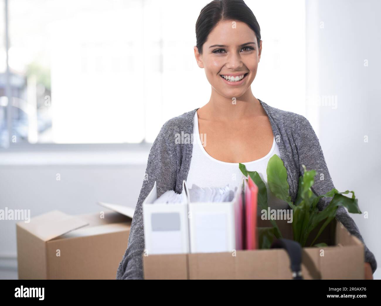 Finally My own office. Portrait of an attractive young woman moving ...