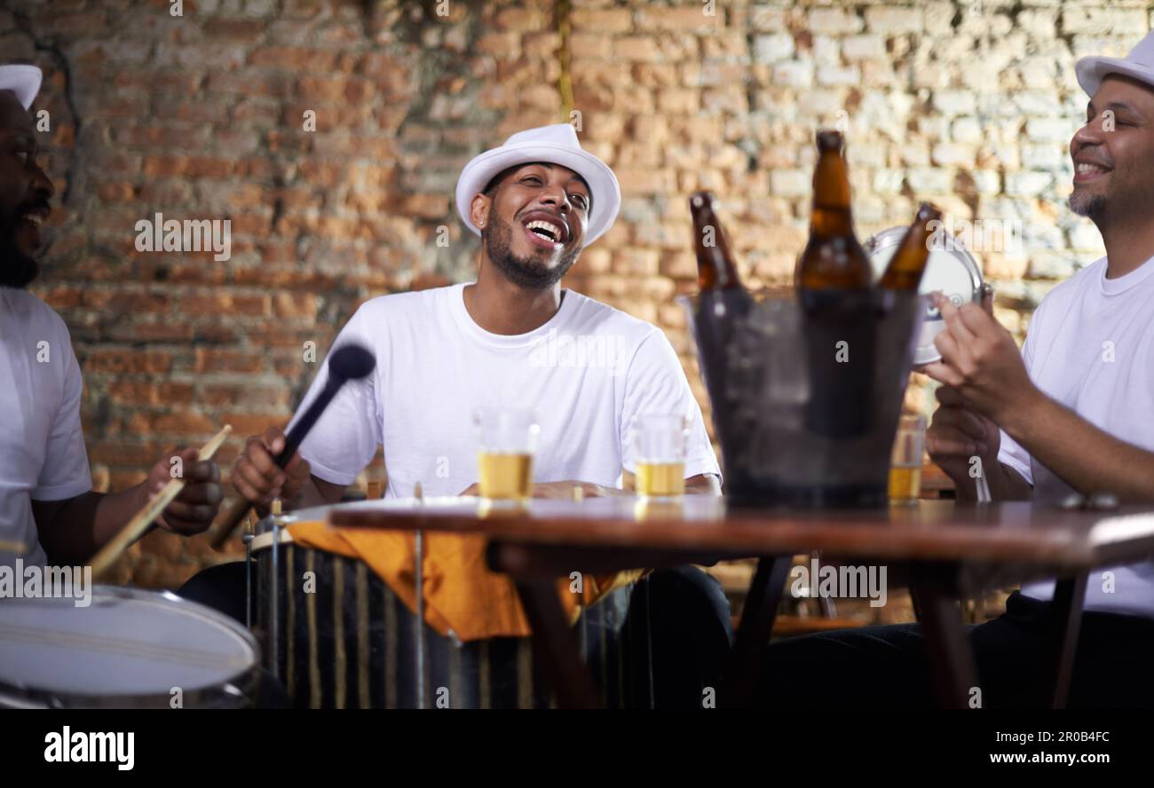 Feeling the beat of Brazil. a band playing their percussion instruments ...