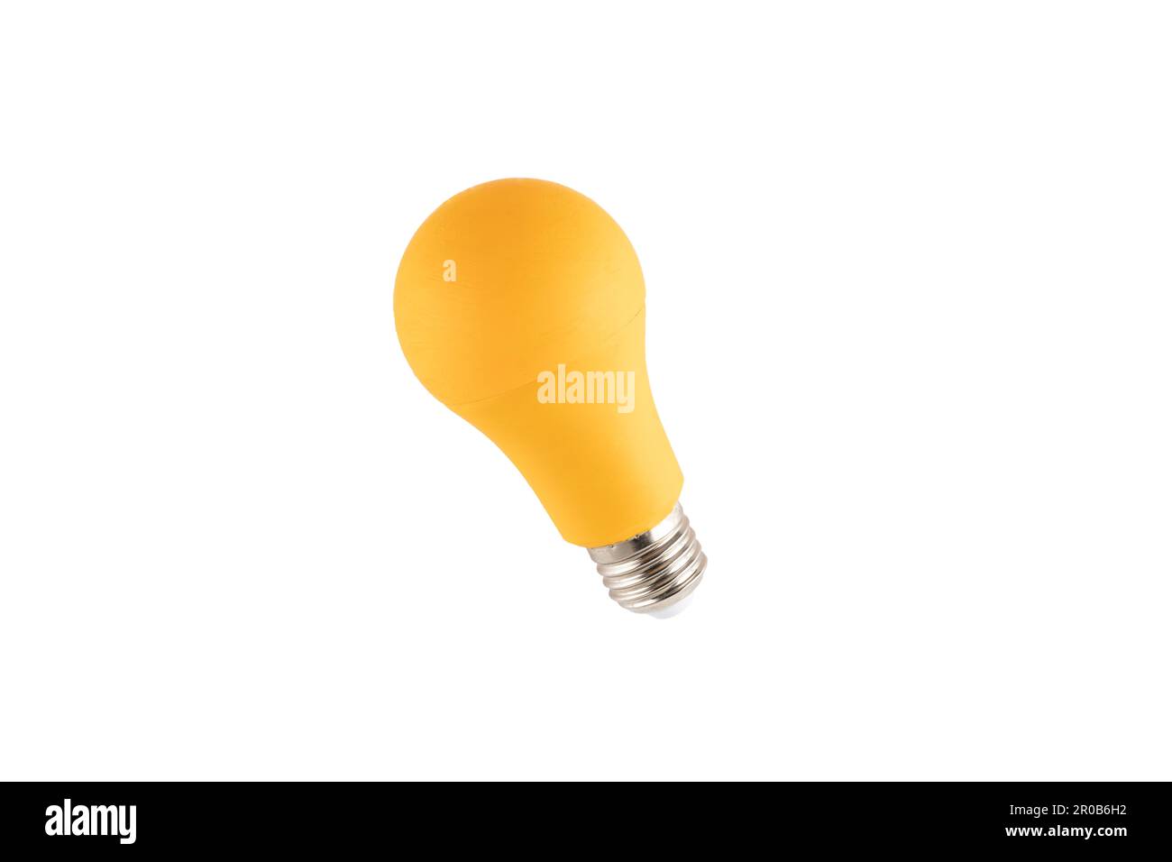 a yellow light bulb isolated on white background Stock Photo - Alamy