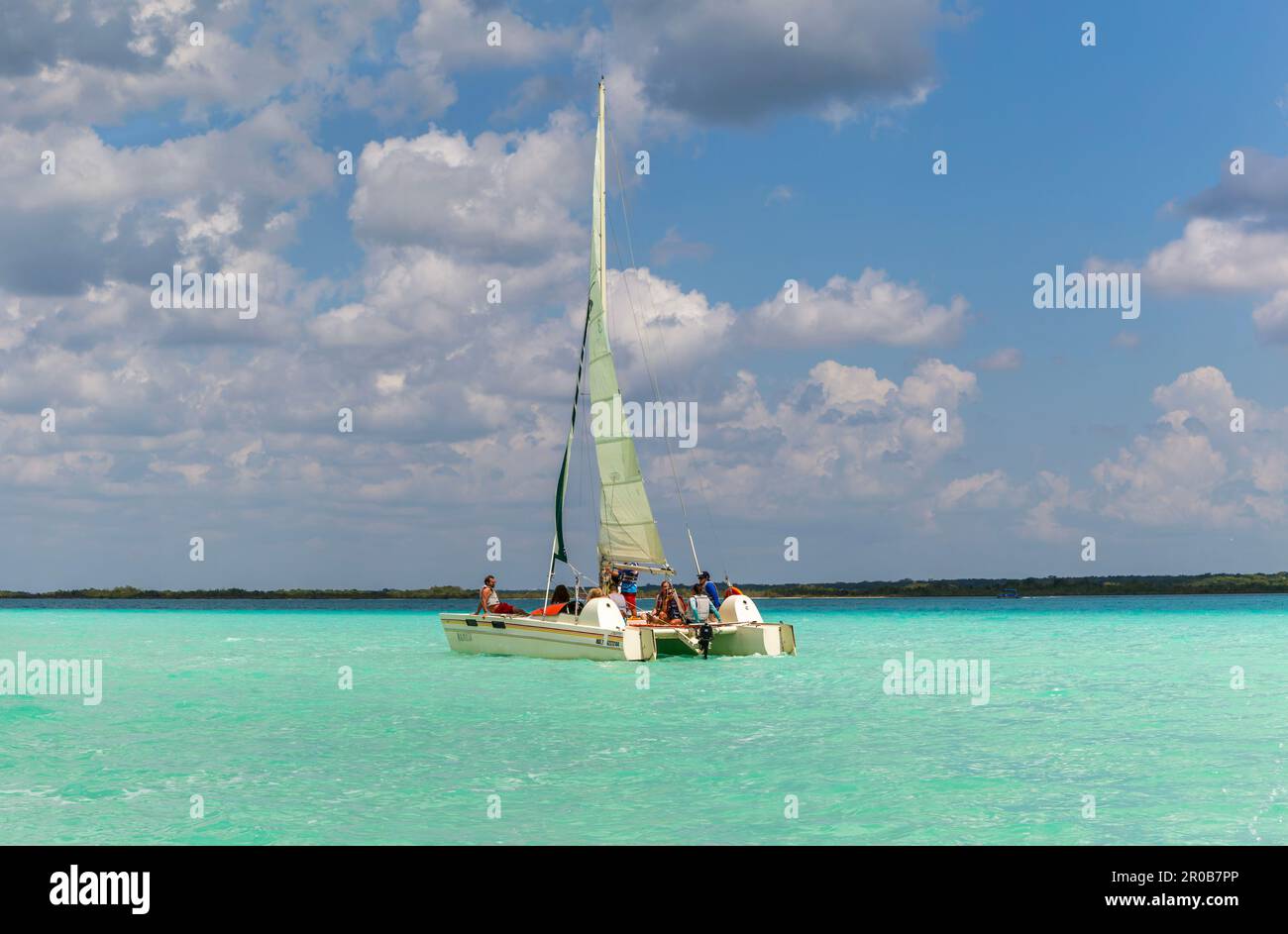 Sailing boat on clear turquoise water, Lake Bacalar, Bacalar, Quintana ...