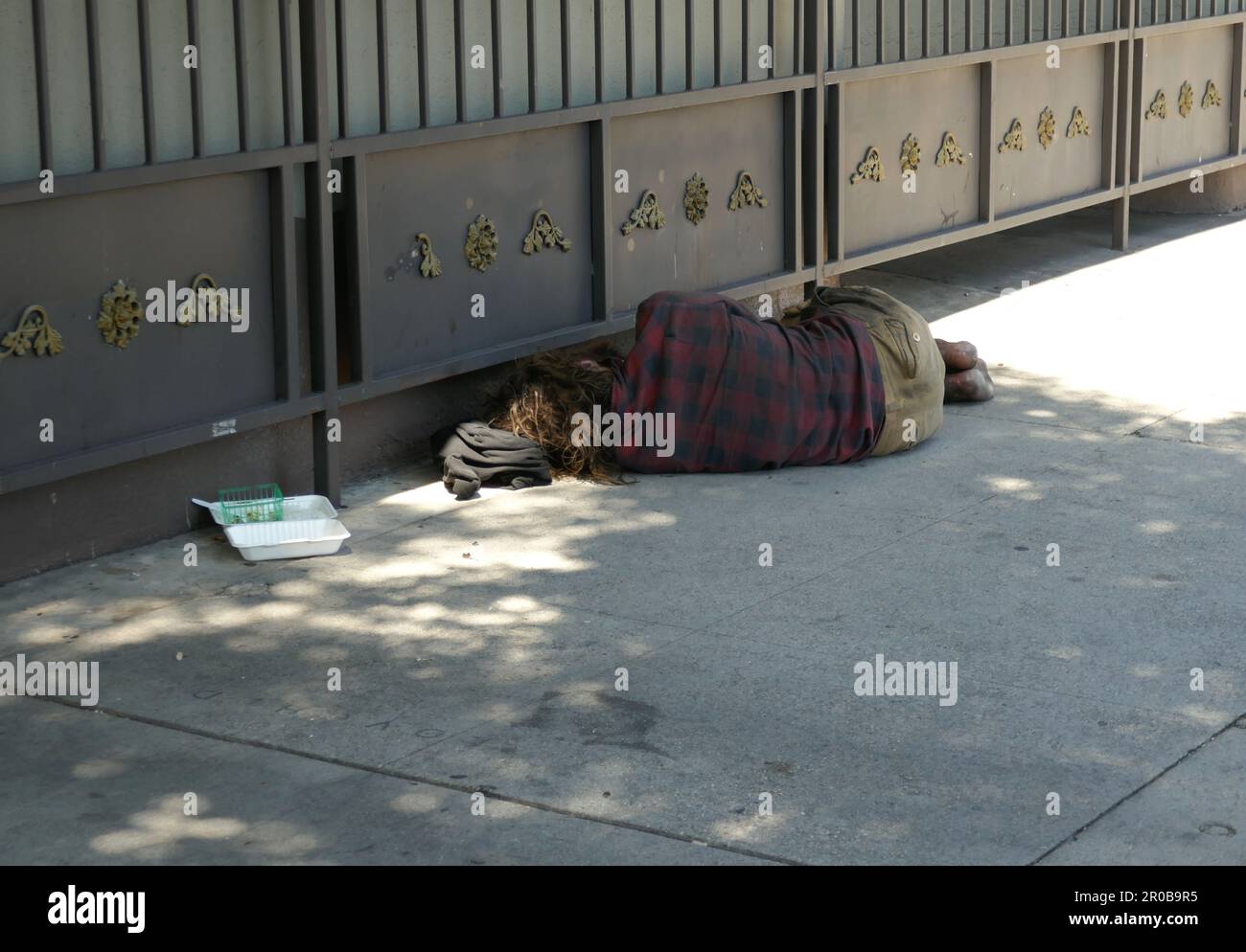 Los Angeles, California, USA 7th May 2023 Homeless man sleeping on ...