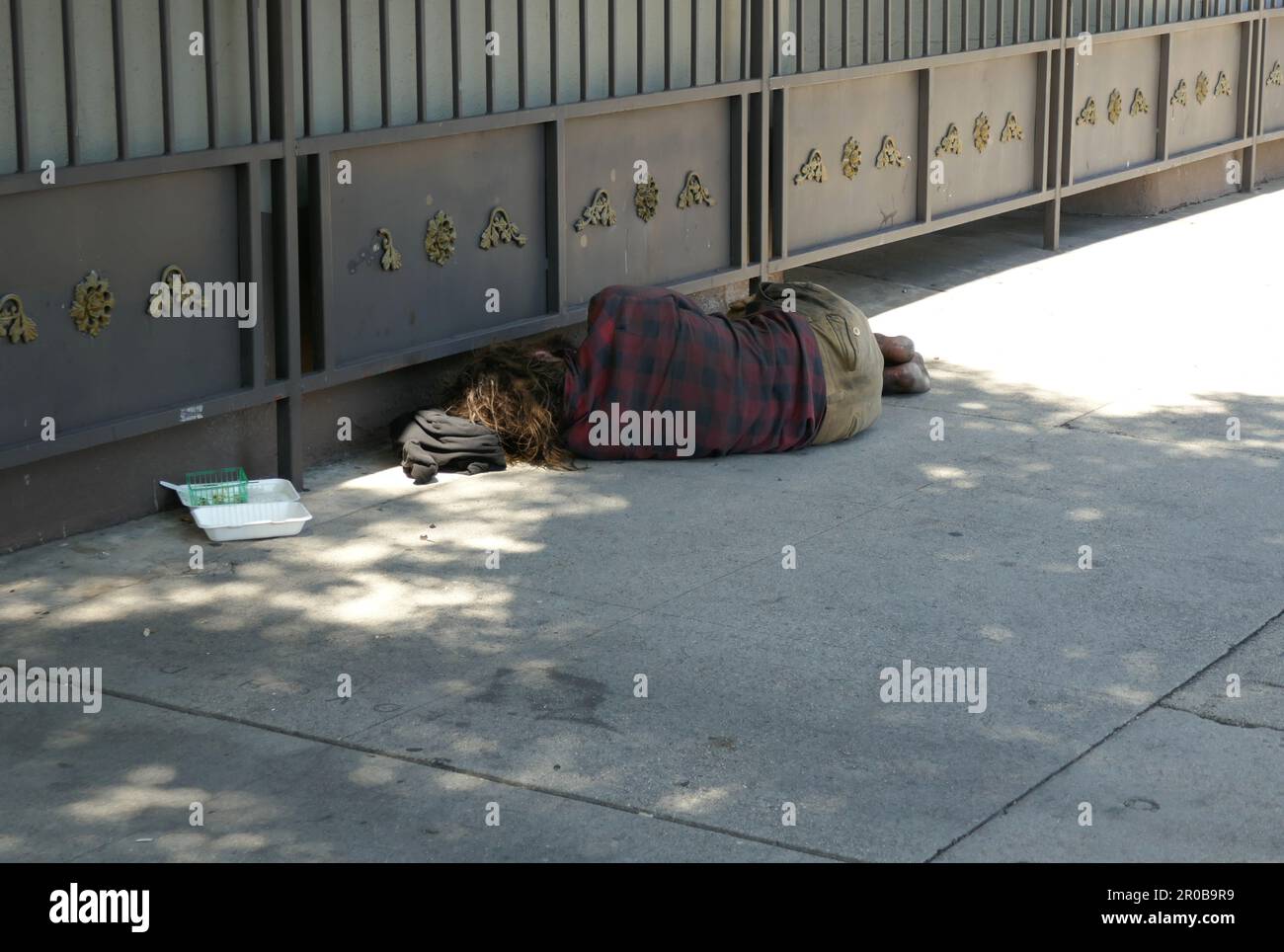 Los Angeles, California, USA 7th May 2023 Homeless man sleeping on ...
