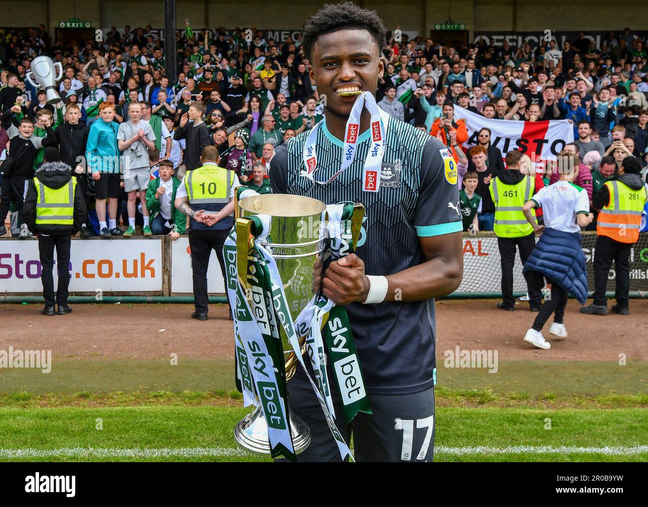 Bali Mumba #17 of Plymouth Argyle celebrates a promotion to ...
