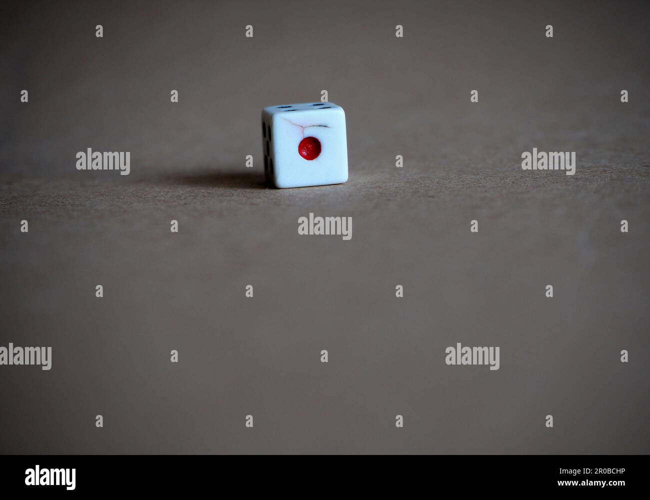 White dice show one. Dice show ace Stock Photo - Alamy