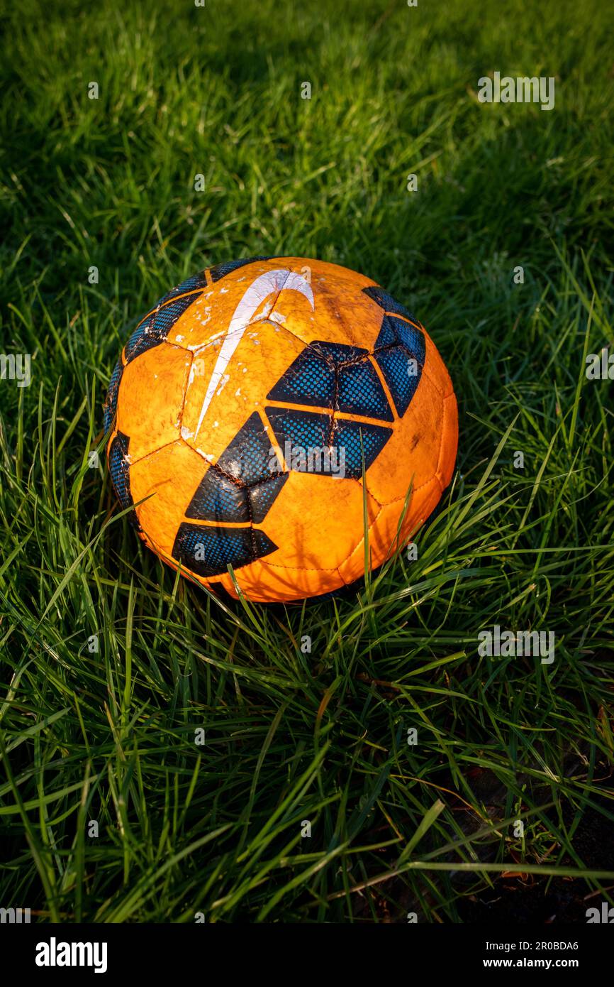 Nike orange football Stock Photo - Alamy