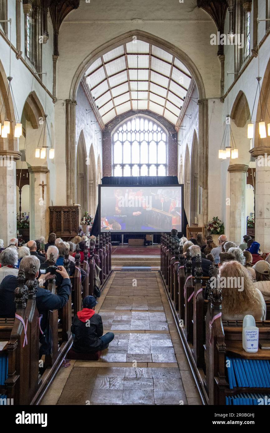 People seated in St Michael's church Framlingham Suffolk and watching ...