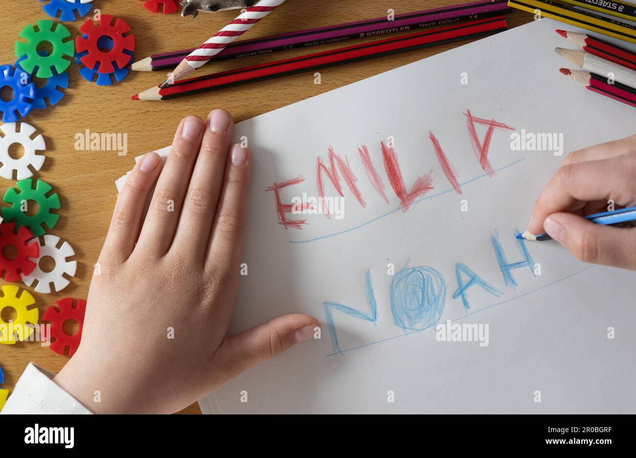 Leipzig, Germany. 08th May, 2023. A girl writes the first names Noah ...