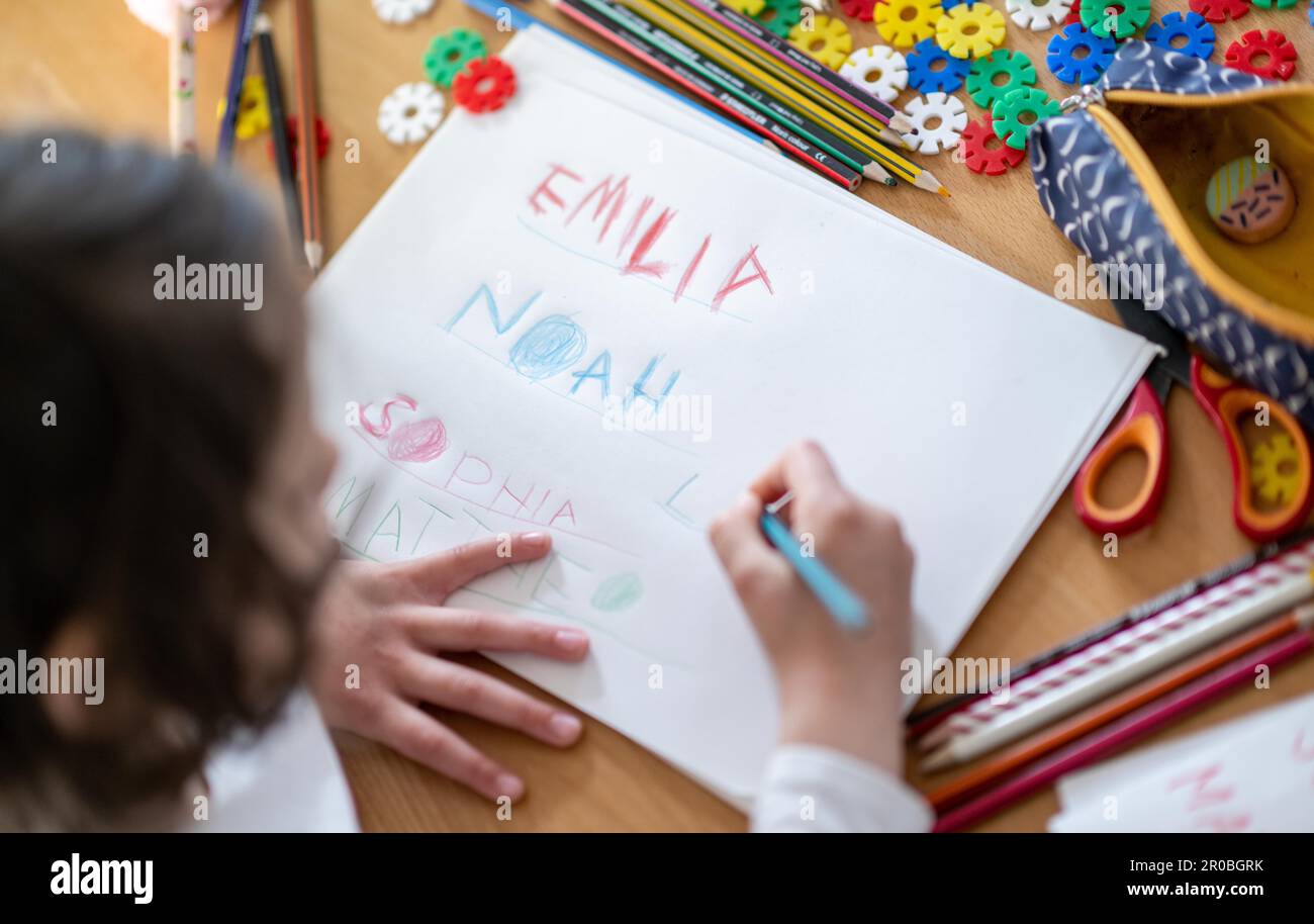 Leipzig, Germany. 08th May, 2023. A girl writes the first names Noah ...