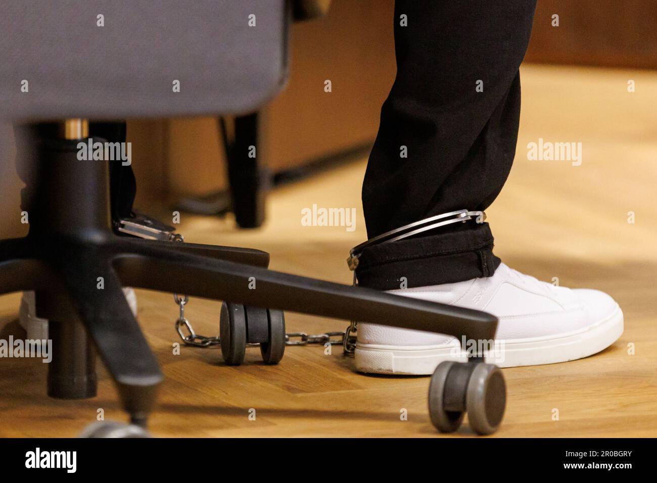 Nuremberg, Germany. 08th May, 2023. A man charged with murder sits next ...